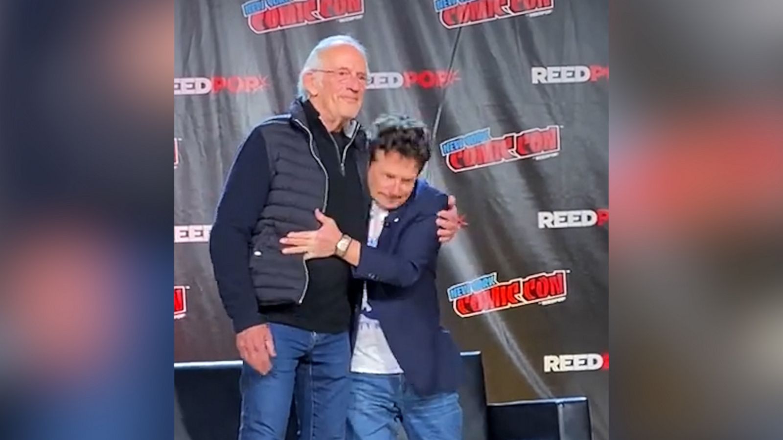 Michael J. Fox and Christopher Lloyd share a hug at New York Comic Con ...
