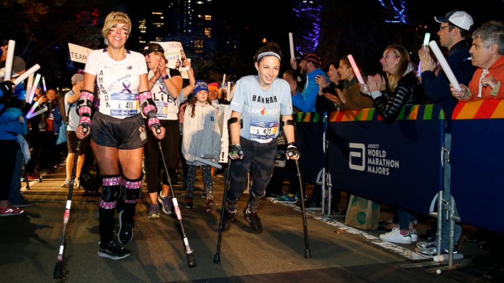 Paralyzed woman completes NYC Marathon on crutches for others 'who aren ... Paralyzed woman completes NYC Marathon on crutches for others 'who aren ...