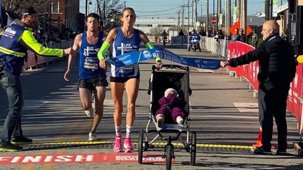 Mom sets likely world record for half-marathon while pushing a stroller ...