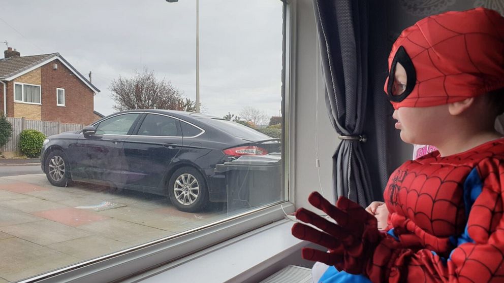 'Spider-Man' runs the streets of England cheering kids up in ...