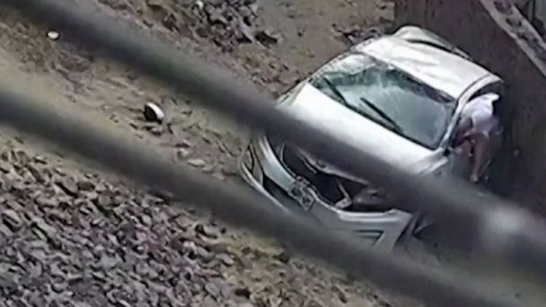 Video Man Survives Car Crash After Overturning Crashing Into Wall