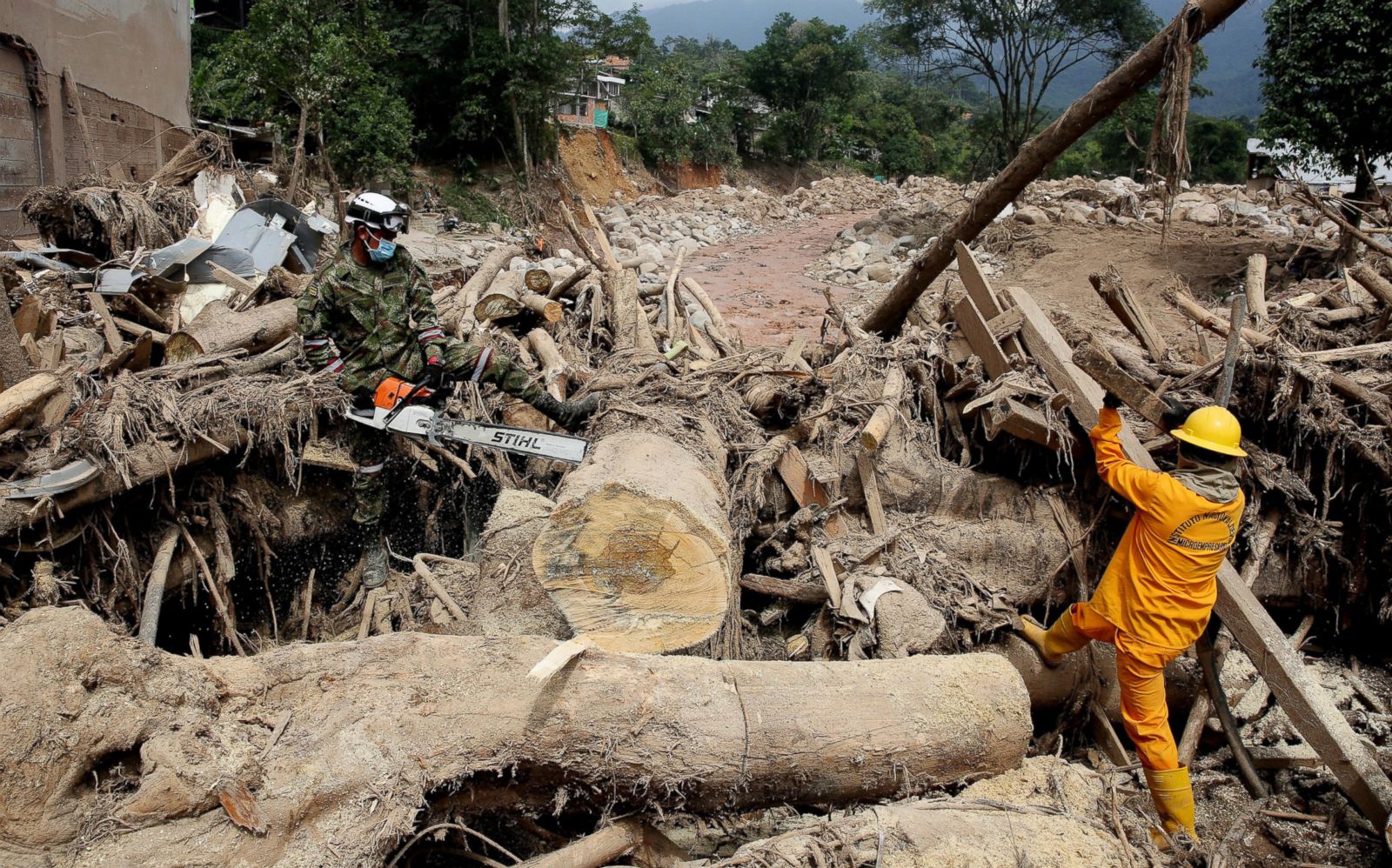 Colombia looks for victims and survivors after flash floods Photos ...