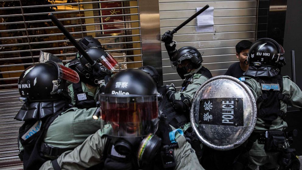 Hong Kong protester shot by police while a pro-China man is set on fire ...