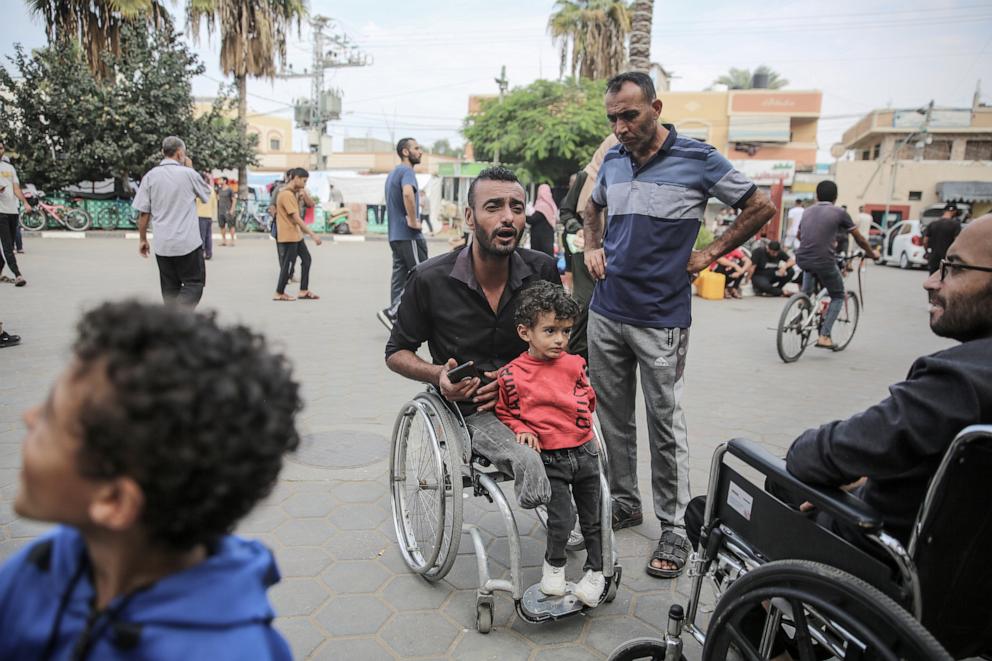 Father in Gaza travels over 8 miles in wheelchair to get baby's first ...