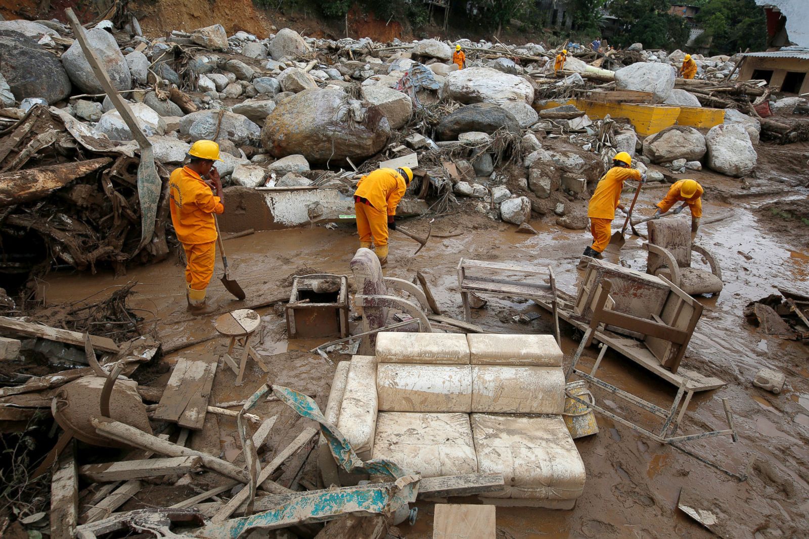 Colombia looks for victims and survivors after flash floods Photos ...