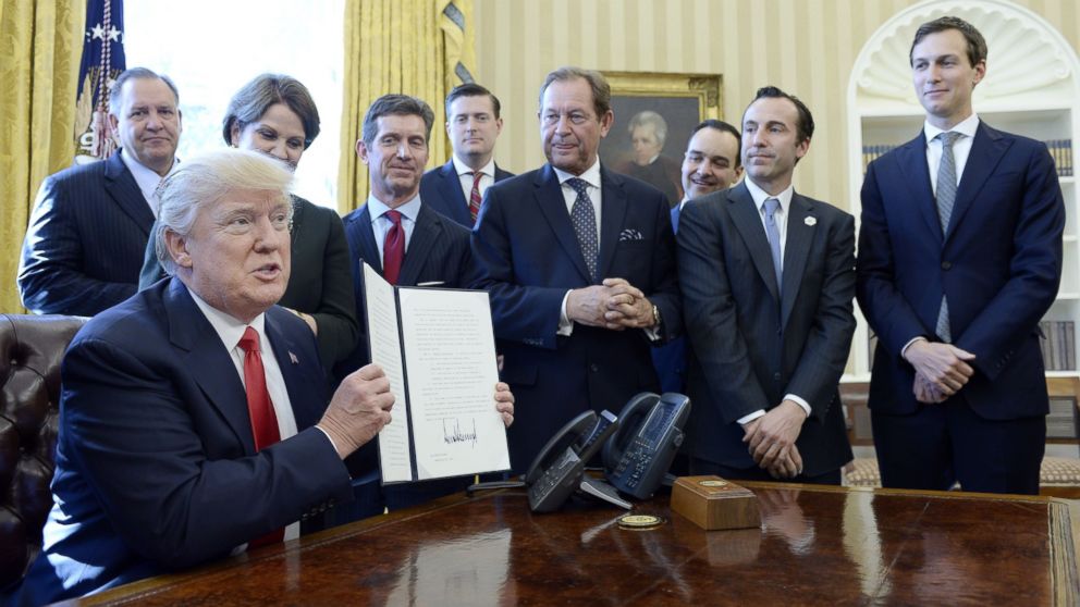 Trump signs executive order to help remove 'job-killing regulations ...