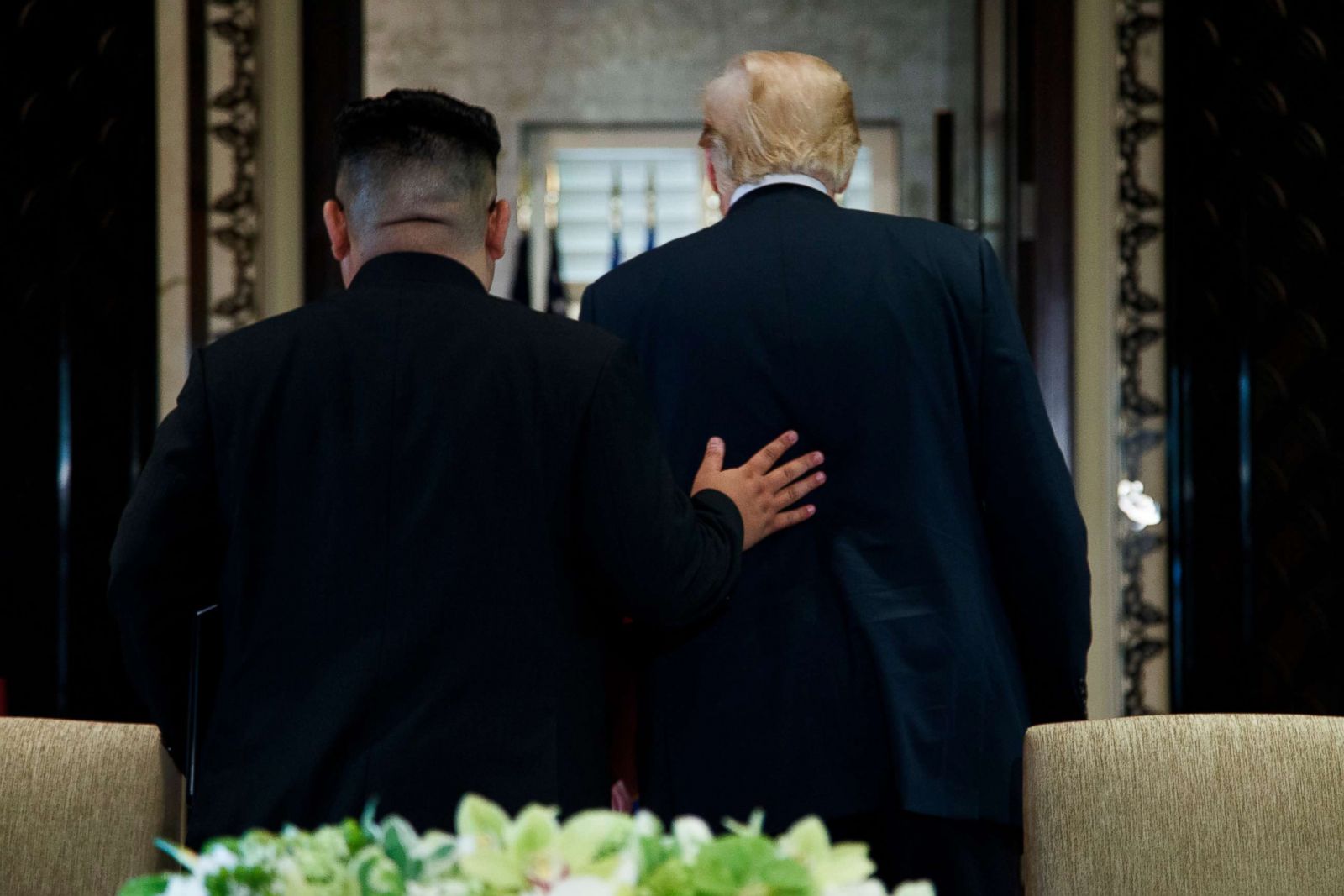 Trump goes face to face with Kim in historic summit with North Korea ...