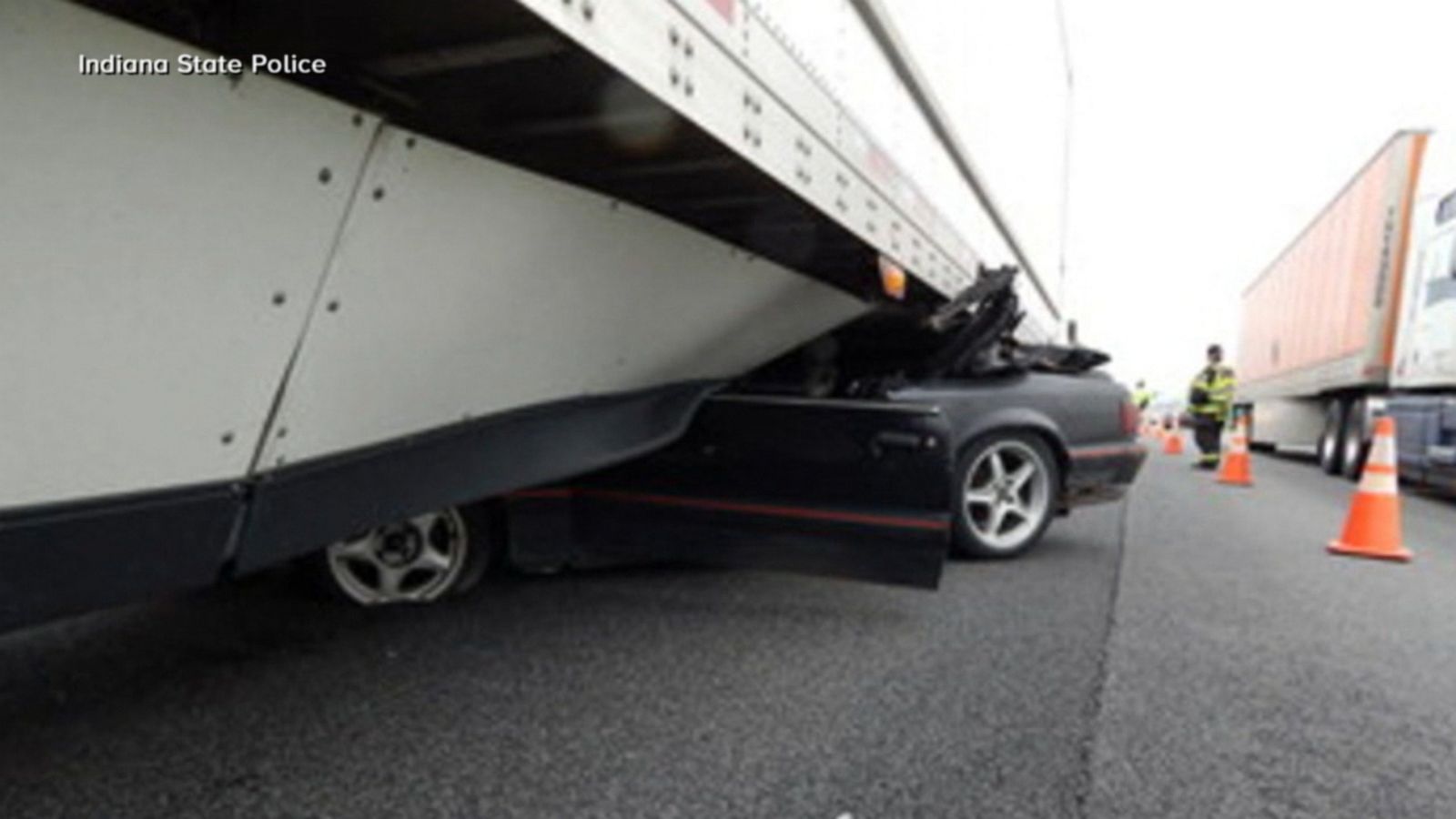 No injuries after car gets wedged under semi-truck - Good Morning America