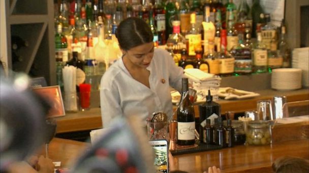 Video Ocasio-Cortez goes back to work as bartender - ABC News