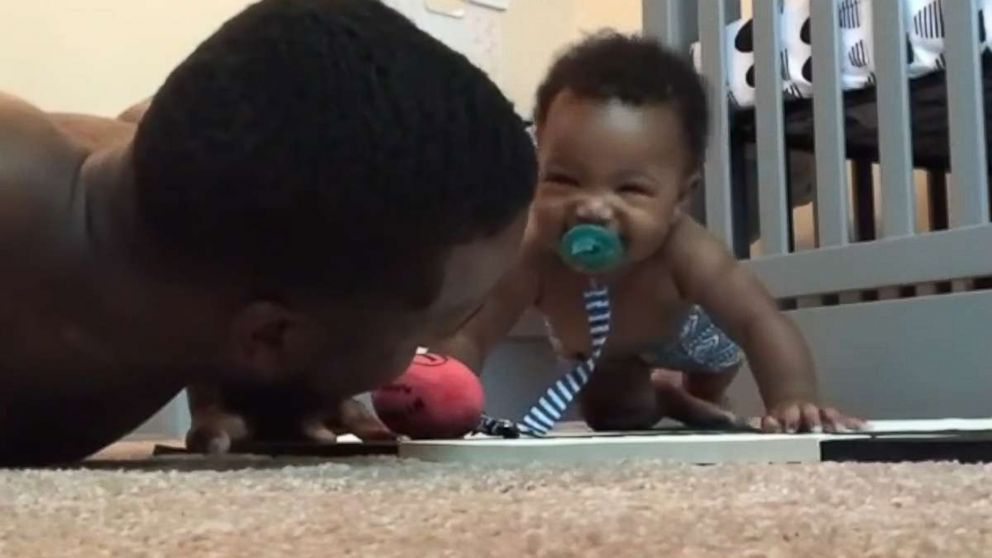 This sweet baby doing push-ups with his trainer dad is all you need to ...