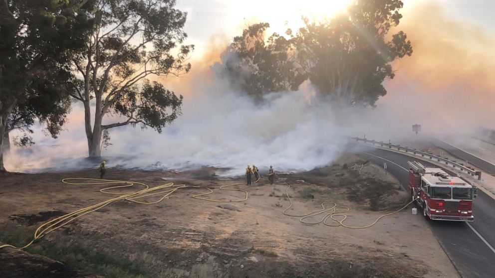 Fires in California as new storm moves across US with heavy snow and ...