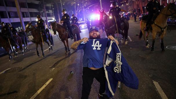 Police clash with 'hostile' fans in Los Angeles after Dodgers win World ...