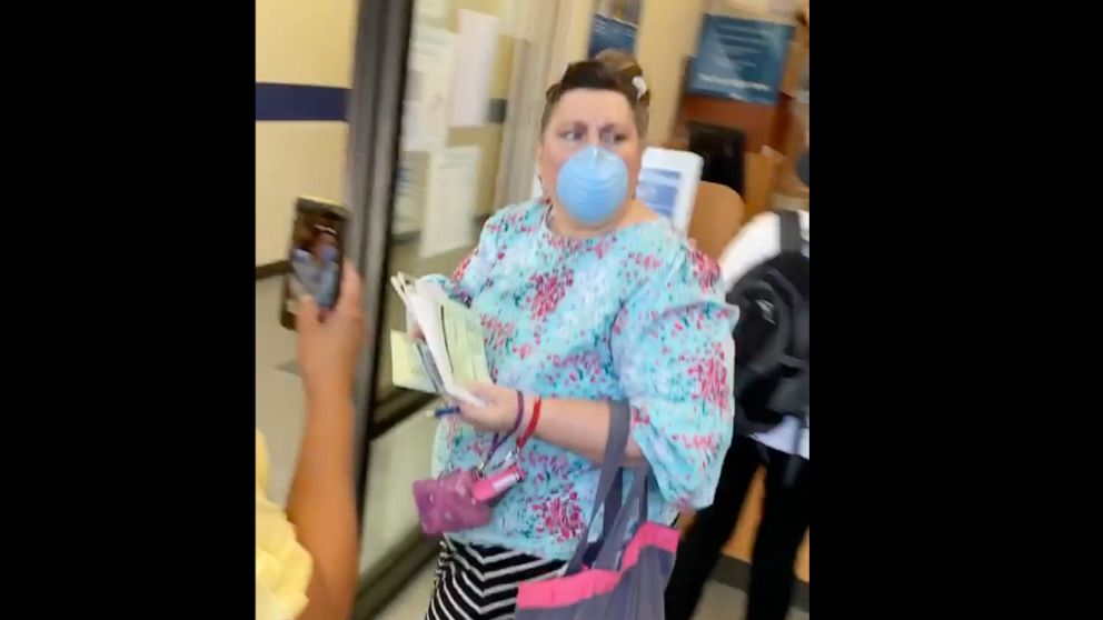 Woman filmed using anti-Asian slur against postal worker - ABC News